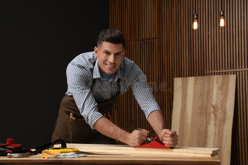 Handsome Carpenter Working with Timber at Table Stock Image - Image of ...