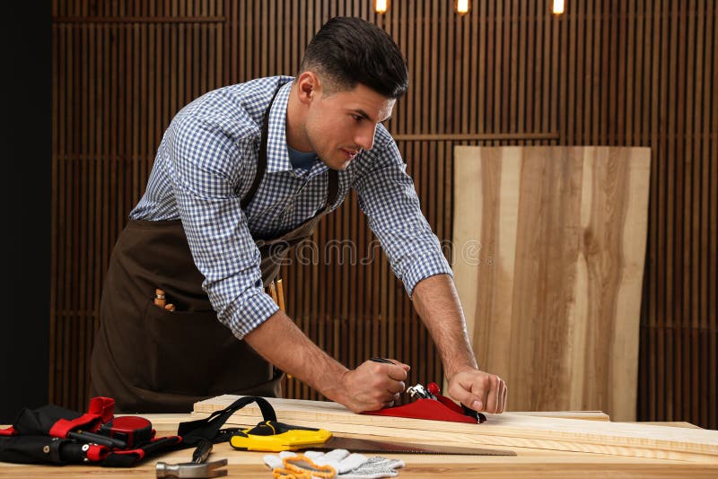 Handsome Carpenter Working with Timber at Table Stock Image - Image of ...