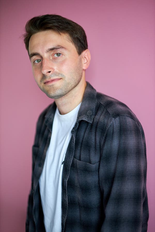 Handsome Caucasian Guy In Casual Shirt Posing At Camera Isolated Stock
