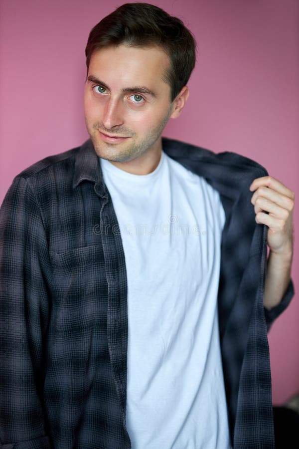 Handsome Caucasian Guy In Casual Shirt Posing At Camera Isolated Stock