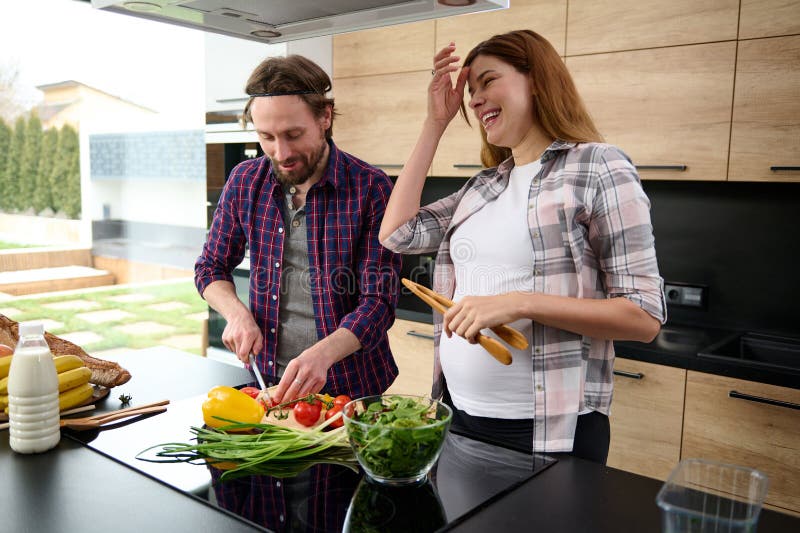 Handsome Caucasian Man Slicing Vegetables Preparing Healthy Vegan Food
