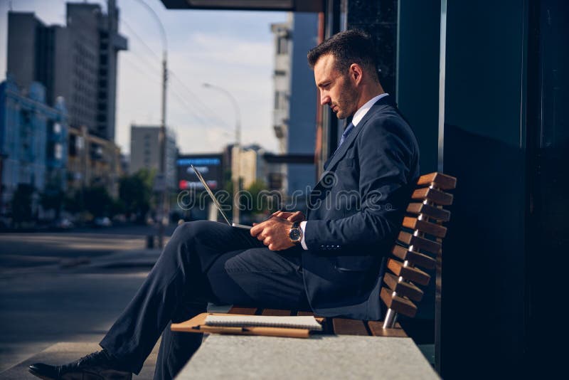 Concentrated Brunette Male Working Online Alone Outside Stock Image ...