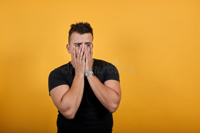 Handsome Caucasian Young Man Covered Face with Hands, Unhappy. Stock ... Handsome Caucasian Young Man Covered Face with Hands, Unhappy. Stock ...