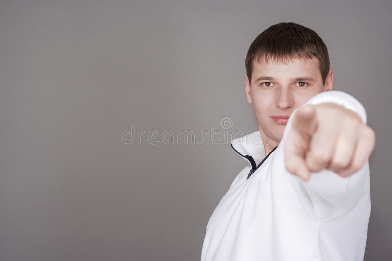Handsome Caucasian Young Man Pointing Forward Using His Point Finger ...