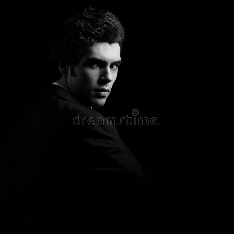 A Handsome Charismatic Young Man with Dark Green Eyes Stock Photo ...