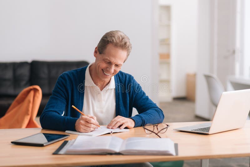 Handsome Cheerful Man Holding a Pencil Stock Image - Image of business ...