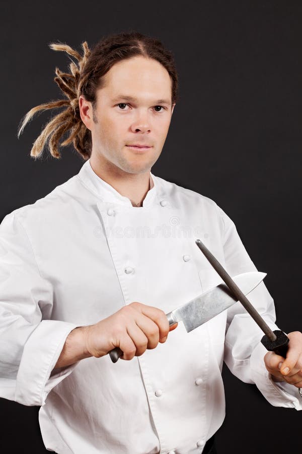 Handsome Chef Sharpening His Knife Stock Photo - Image of working, cook ...