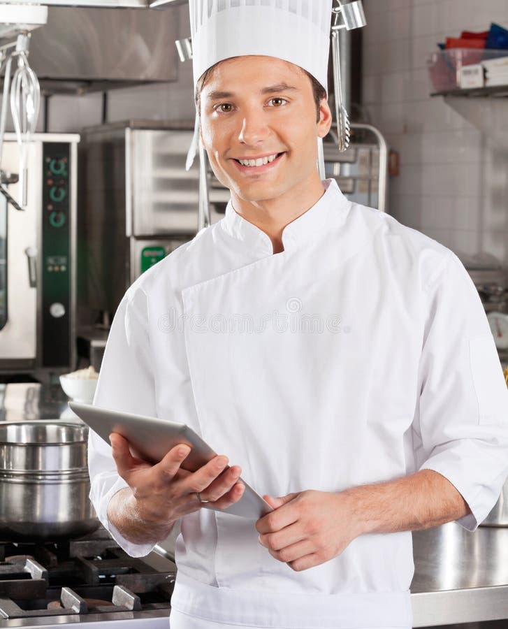Handsome Chef with Tablet Computer Stock Photo - Image of communication ...