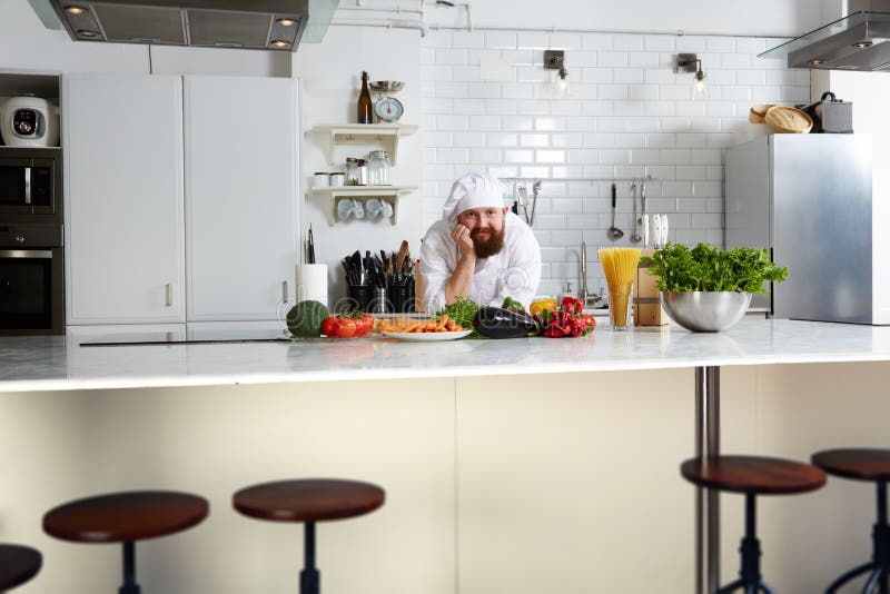 Handsome Chef in Uniform Standing on the Kitchen Stock Photo - Image of ...
