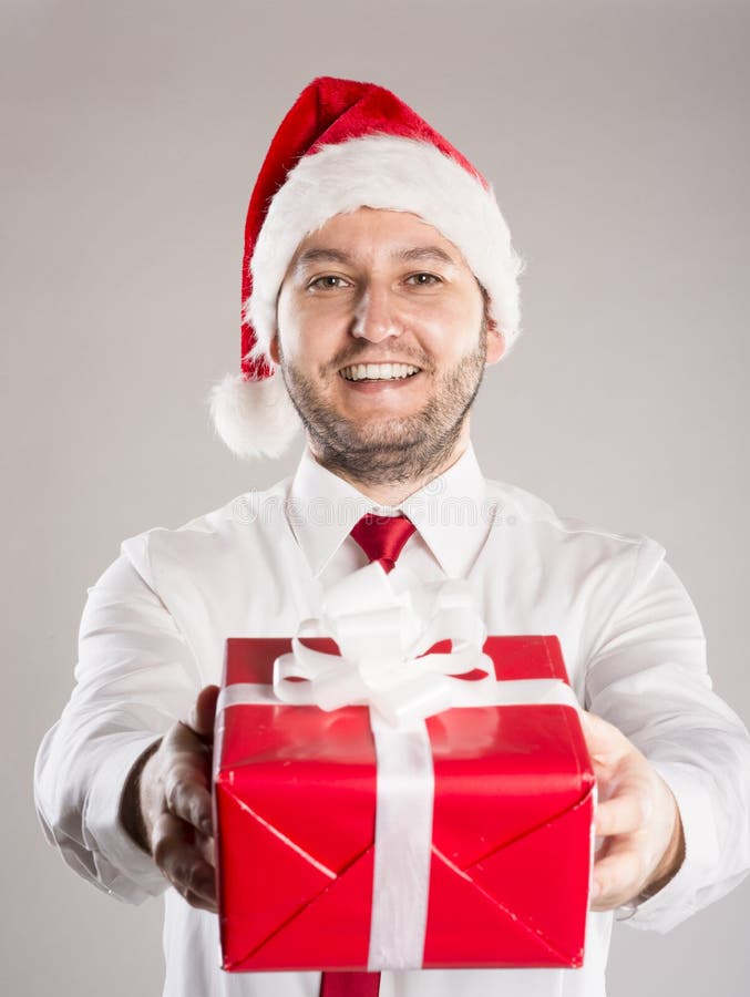 Handsome christmas man stock image. Image of present - 34135707