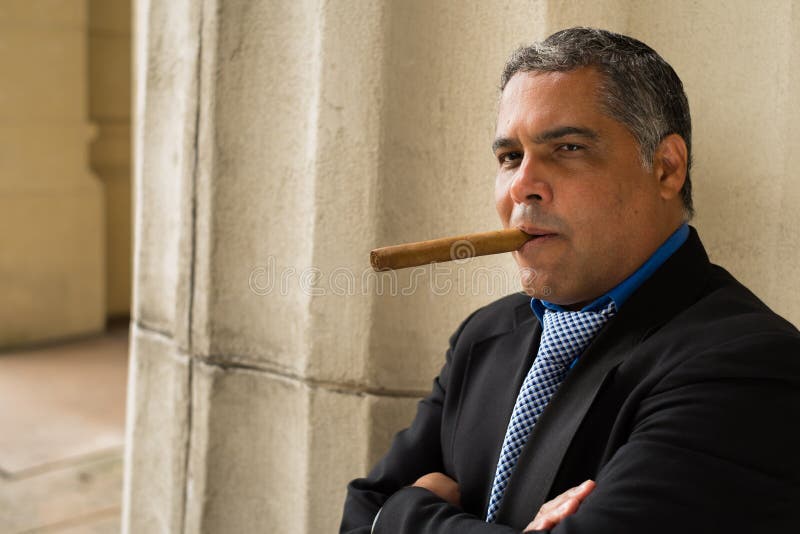Handsome cigar smoker stock image. Image of handsome - 31631441