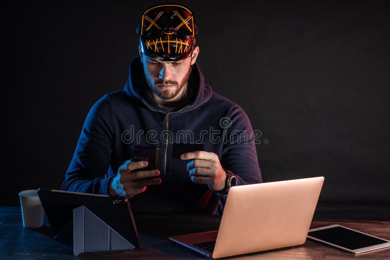 Handsome Clever Hacker with Bank Card and Laptop Stock Photo - Image of ...