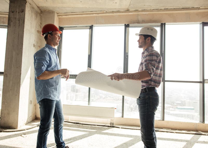 Handsome Client is Discussing the Project with a Chief Engineer Stock ...