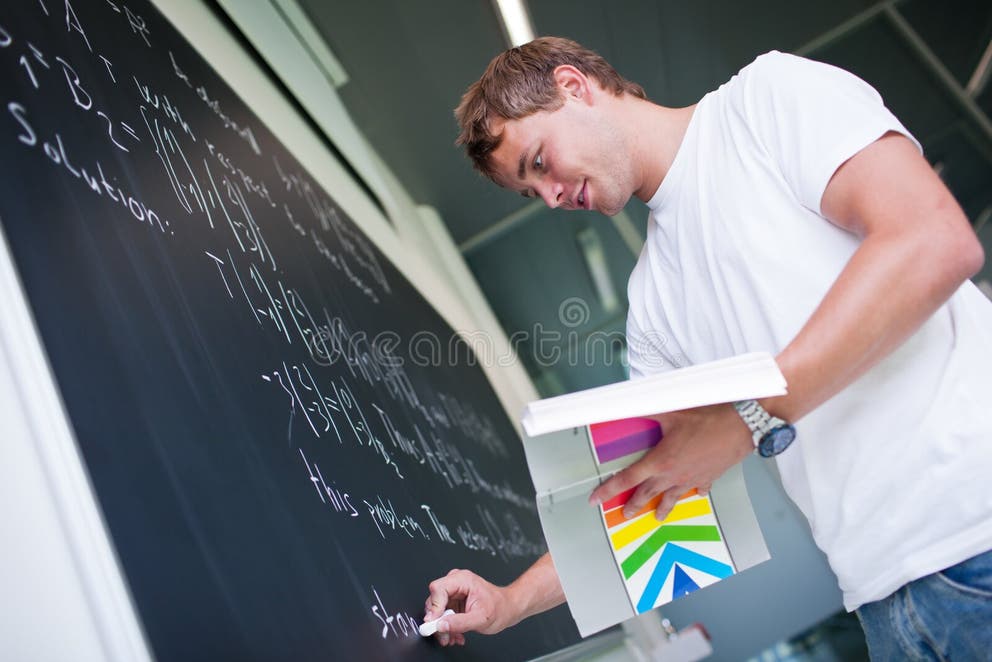Handsome College Student Solving a Math Problem Stock Photo - Image of ...