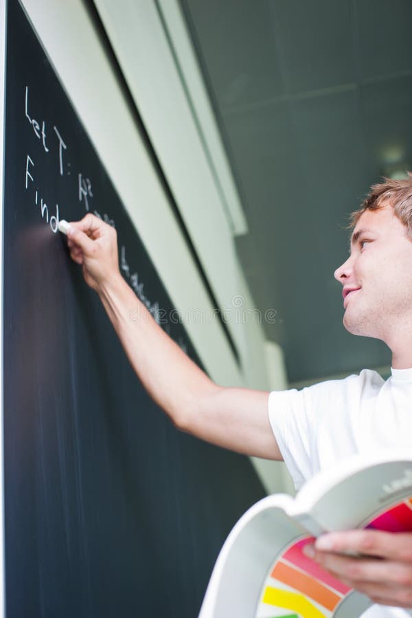 Handsome College Student Solving a Math Problem Stock Image - Image of ...