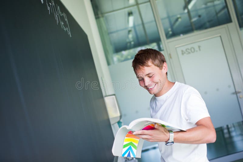 Handsome College Student Solving a Math Problem Stock Photo - Image of ...