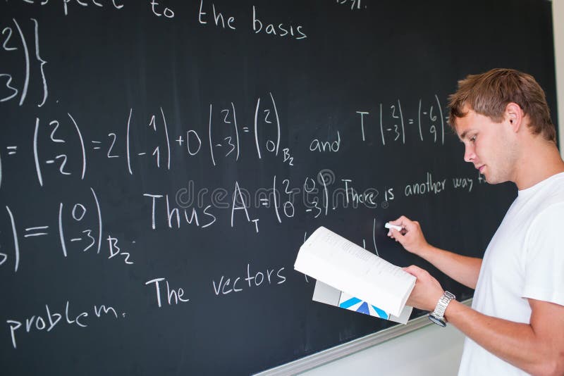 Handsome College Student Solving a Math Problem during Math Class Stock ...
