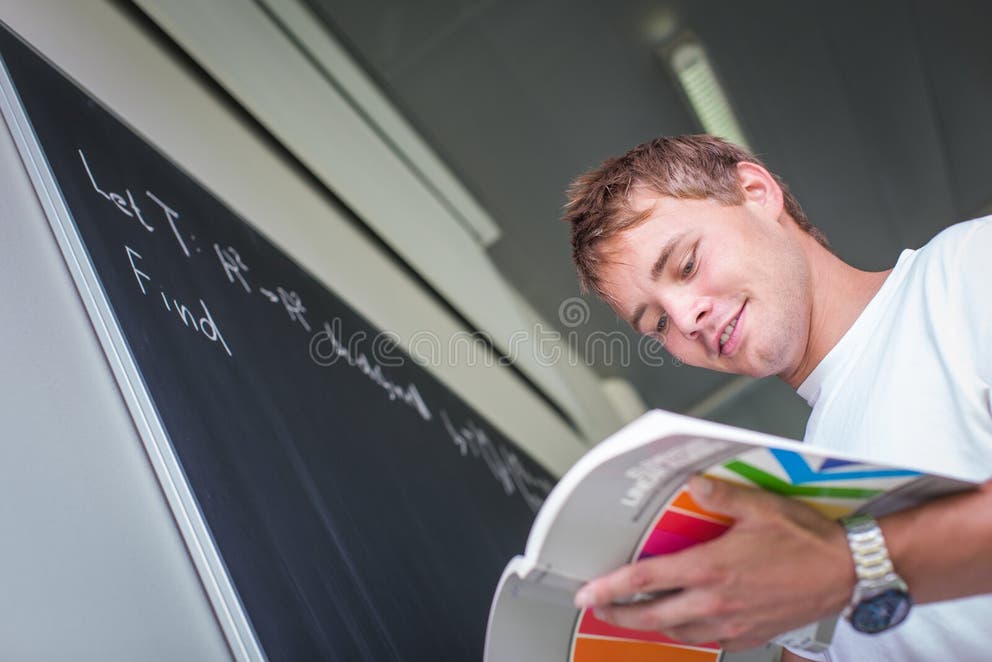 Handsome College Student Solving a Math Problem Stock Photo - Image of ...