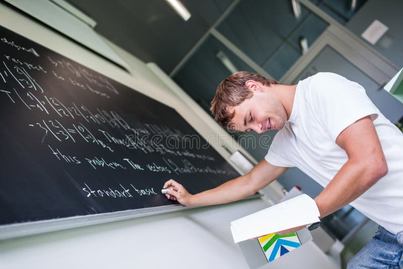Handsome College Student Solving a Math Problem during Math Class Stock ... Handsome College Student Solving a Math Problem during Math Class Stock ...