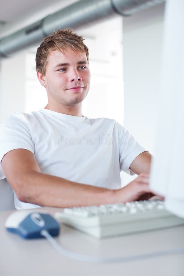 Handsome College Student Using a Computer Stock Image - Image of cute ...