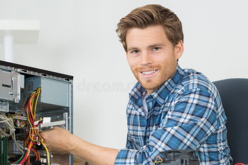 Handsome Computer Engineer Repairing Faulty Pc Stock Photo - Image of ...