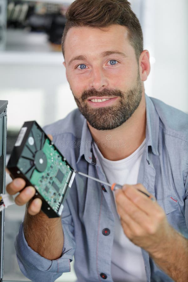 Handsome Computer Repairer Concentrated on Work Stock Image - Image of ...