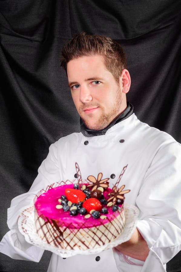Handsome chef with cake stock photo. Image of gift, cook - 25349646