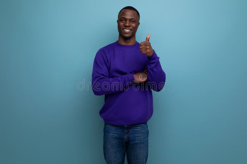 Handsome Confident 30s American Man Dressed in a Blue Sweater Shows ...
