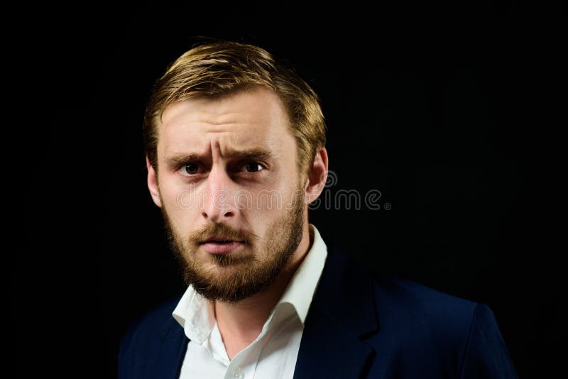 Handsome Confident Man. Serious Guy Posing in Studio. Stock Photo ...