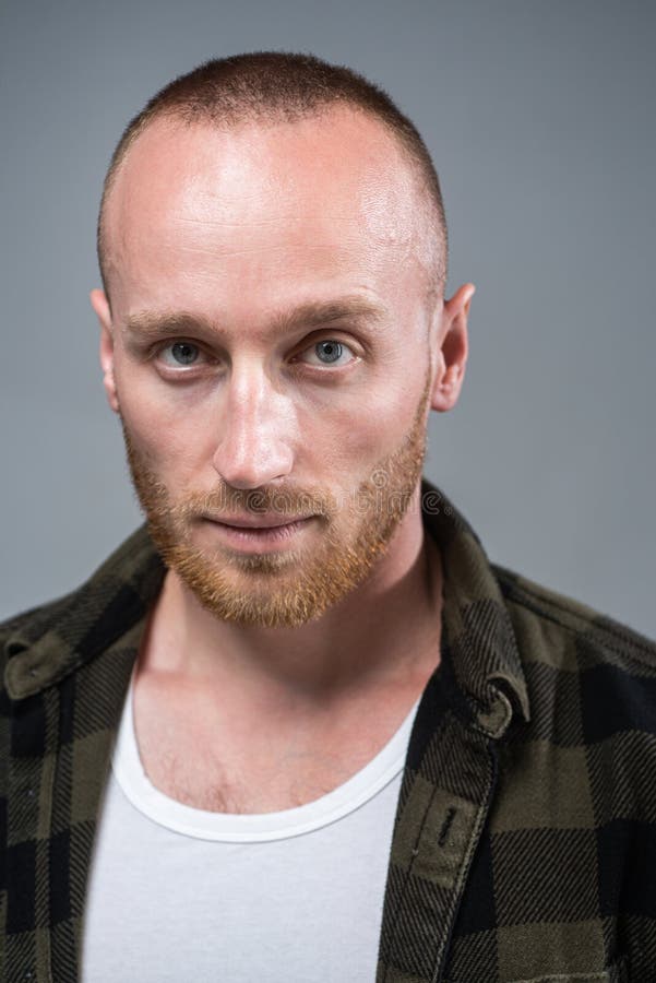 Handsome Confident Man. Serious Guy Posing in Studio. Stock Photo ...