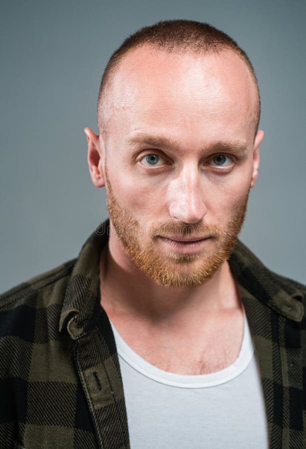 Handsome Confident Man. Serious Guy Posing in Studio. Stock Photo ...
