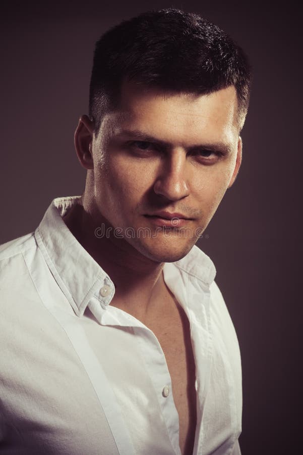 Handsome Confident Young Man Standing in White Shirt Stock Photo ...
