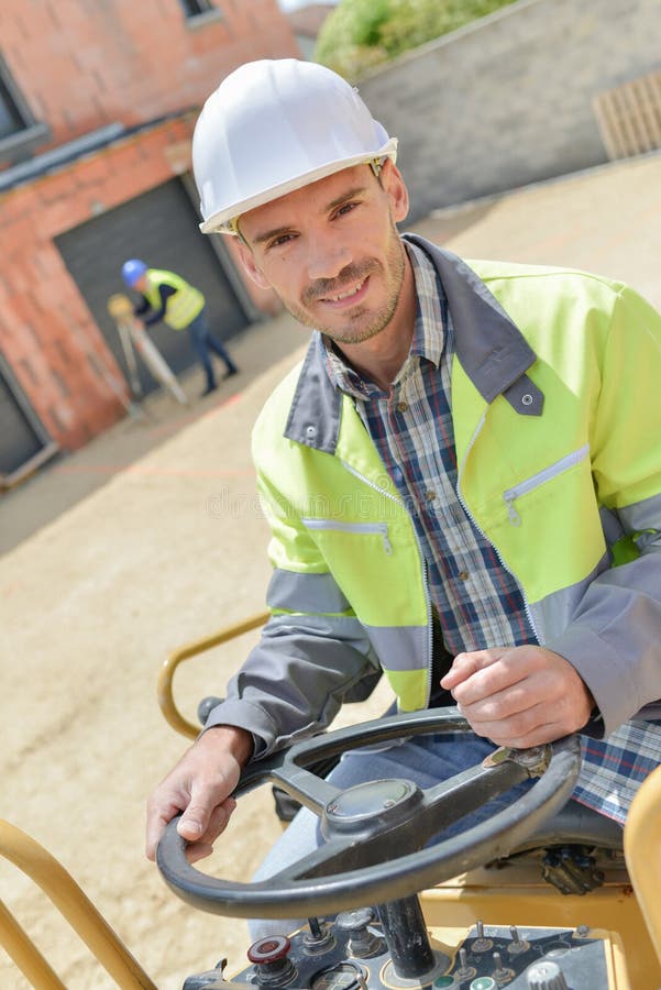 Handsome Construction Worker on Building Industry Construction Site ...