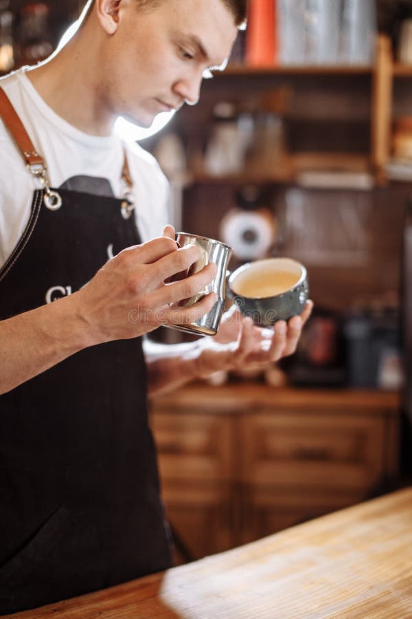 Handsome Man is Making Latte Stock Photo - Image of pattern, hands ...