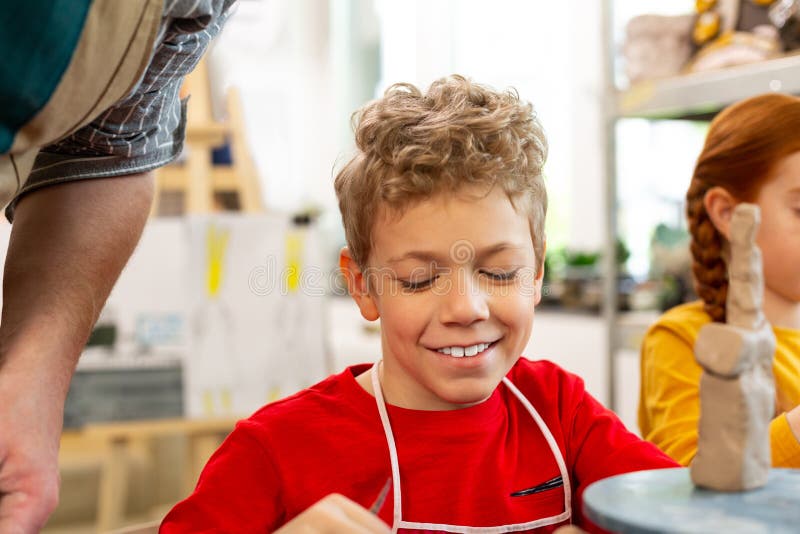 Handsome Curly Boy Smiling while Feeling Good at Art School Stock Image ...