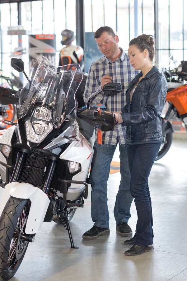 Handsome Customer Listening To Motorcycle Salon Manager Stock Photo ...