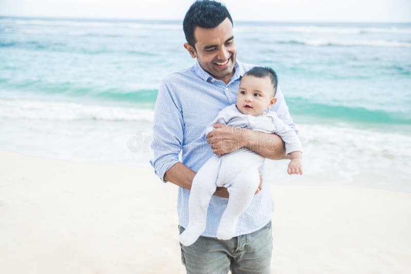 Handsome Dad with His Cute Son Stock Photo - Image of affectionate ...