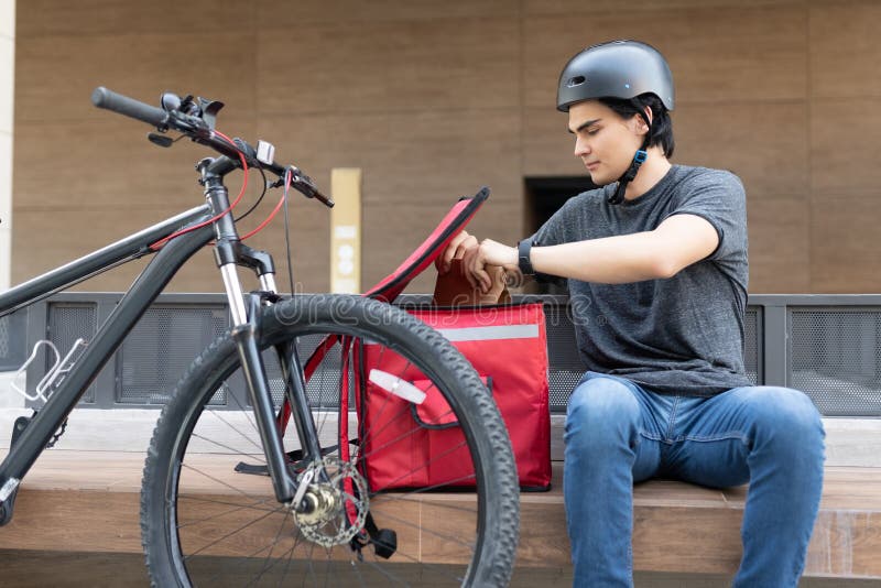 Handsome Delivery Man Opening Backpack on Seat Stock Image - Image of ...