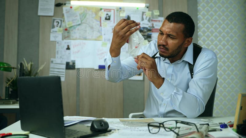 Handsome Detective Working on Evidences of Case Stock Footage - Video ...