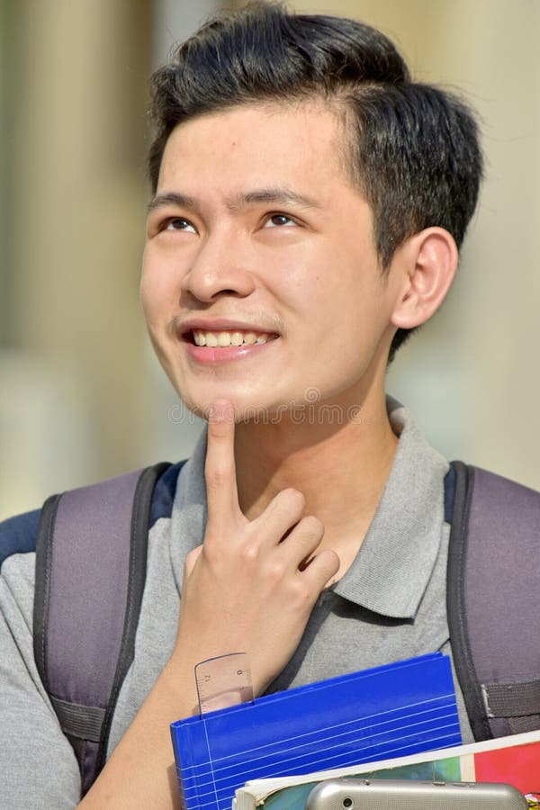 Handsome Diverse Boy Student Making a Decision with Notebooks Stock ...