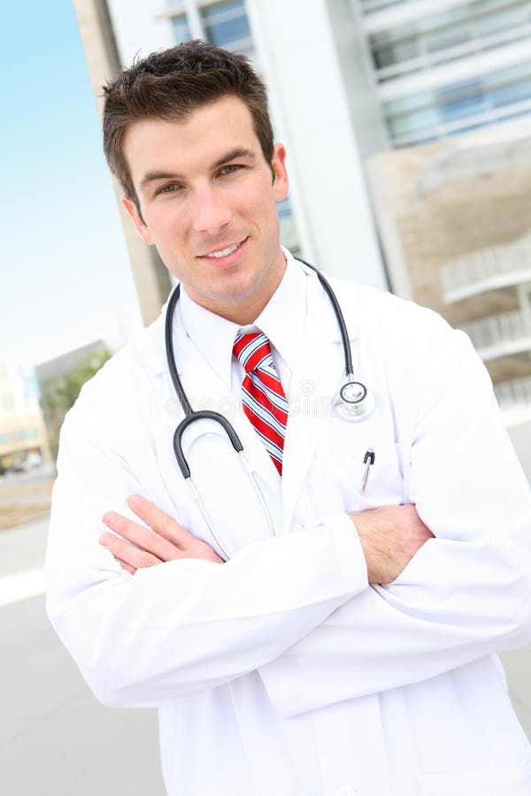 Handsome Doctor at Hospital Stock Photo - Image of health, clinic: 14299756