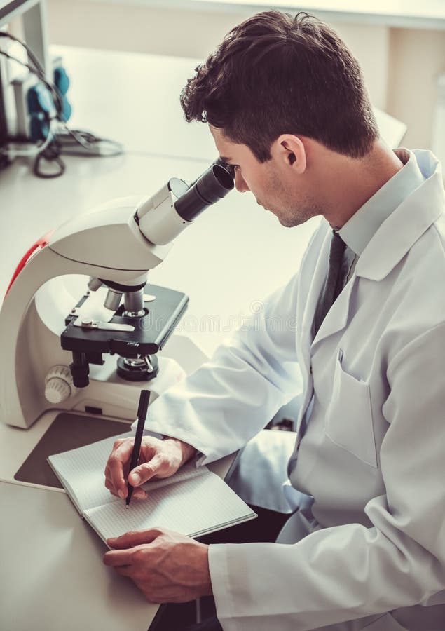 Handsome Doctor in Laboratory Stock Image - Image of experiment ...