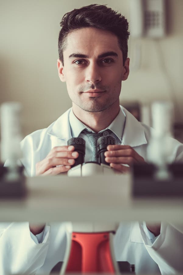 Handsome Doctor in Laboratory Stock Image - Image of microbiology ...