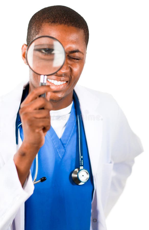 Handsome Doctor Looking through a Magnifying Glass Stock Photo - Image ...