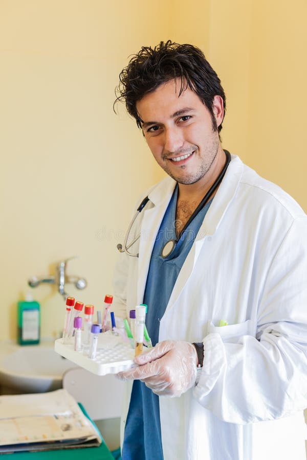 Handsome doctor stock photo. Image of handsome, blood - 42454574