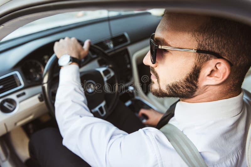 Handsome Driver in Sunglasses Stock Image - Image of auto, safetybelt ...