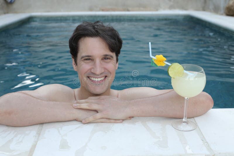 Handsome Dude Drinking a Cocktail in the Pool Stock Photo - Image of ...