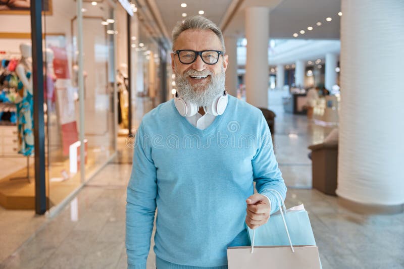 Handsome Elegant Elderly Man with Bags in Shopping Mall Stock Image ...