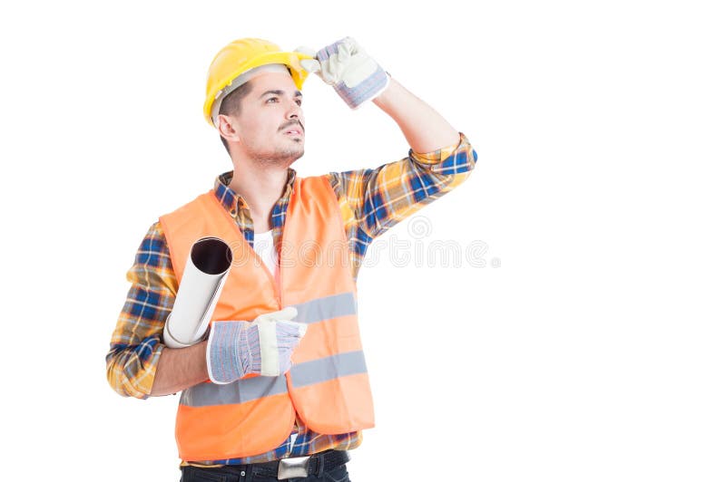 Handsome Engineer Holding a Rolled Paper Plan and Looking Up Stock ...