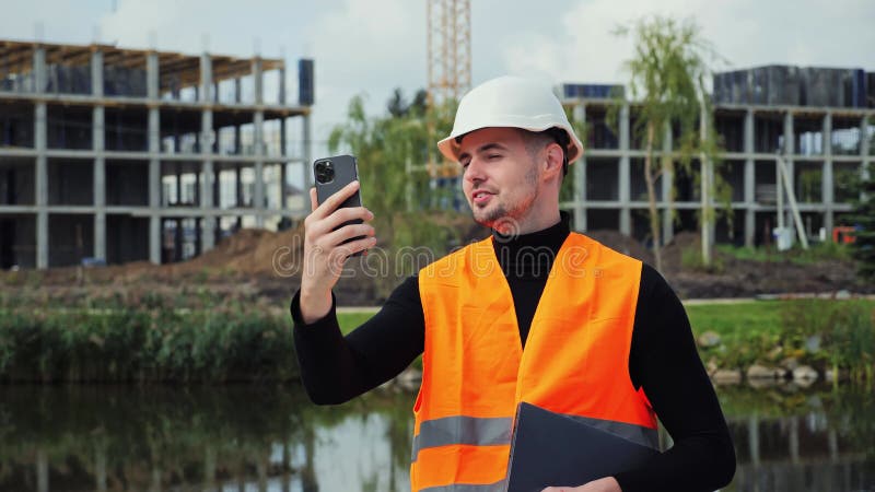 Handsome Engineer Holding Smartphone and Making Video Call with ...